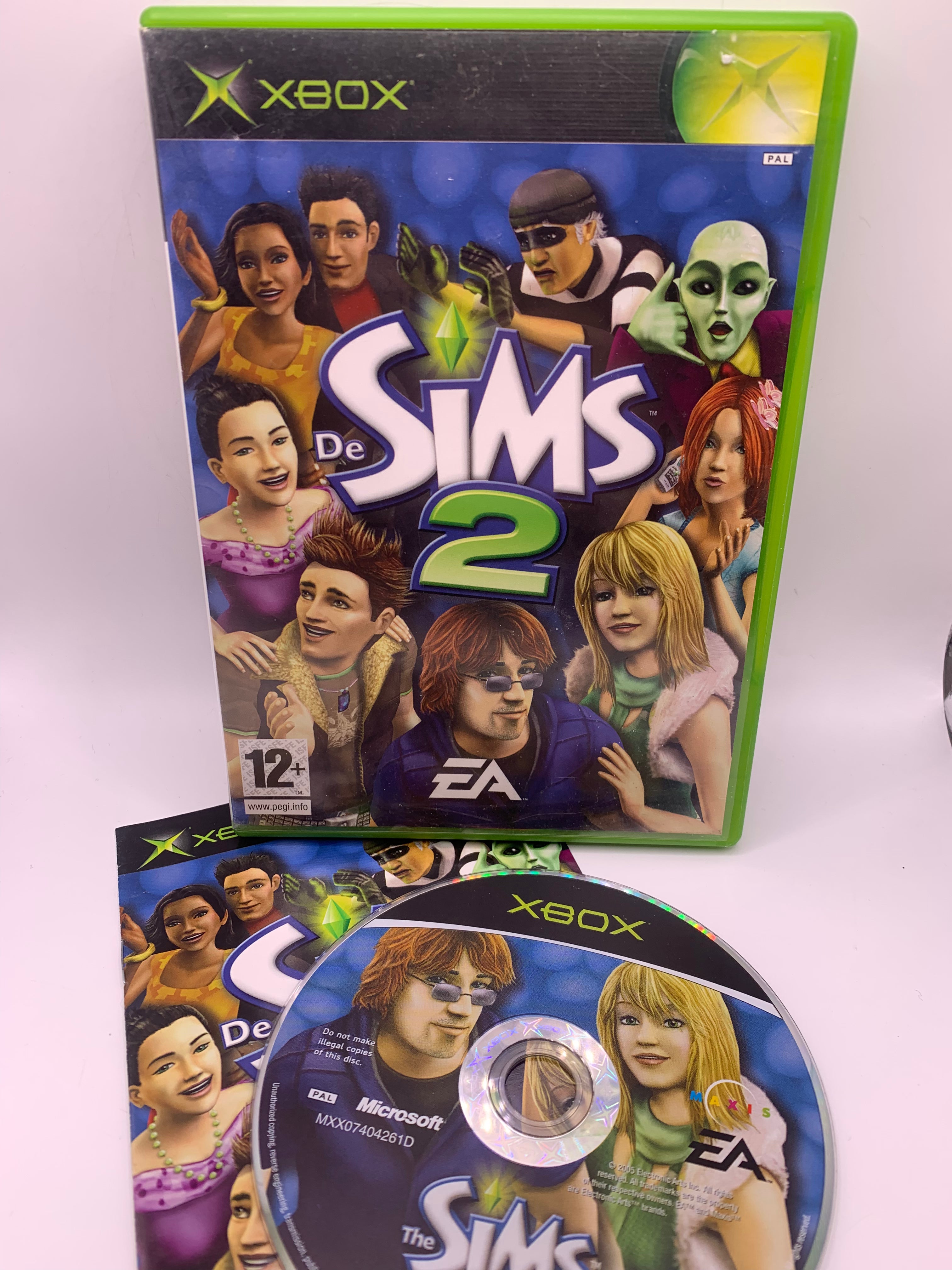 The Sims 2 (NL, cover licht beschadigd) - Xbox Original – Retro Empire ...